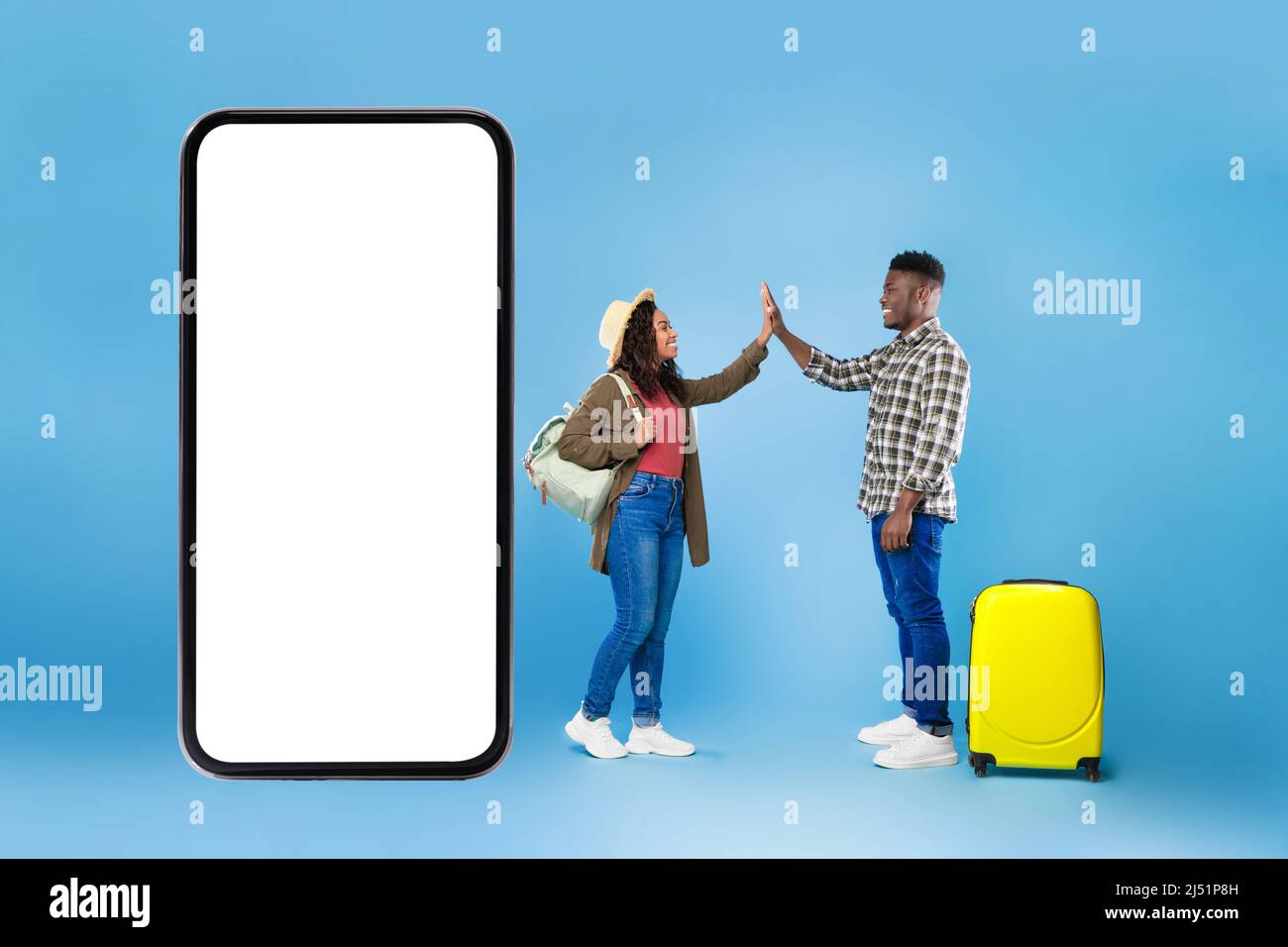 African Tourists Couple Near Phone Giving High Five, Blue Background ...
