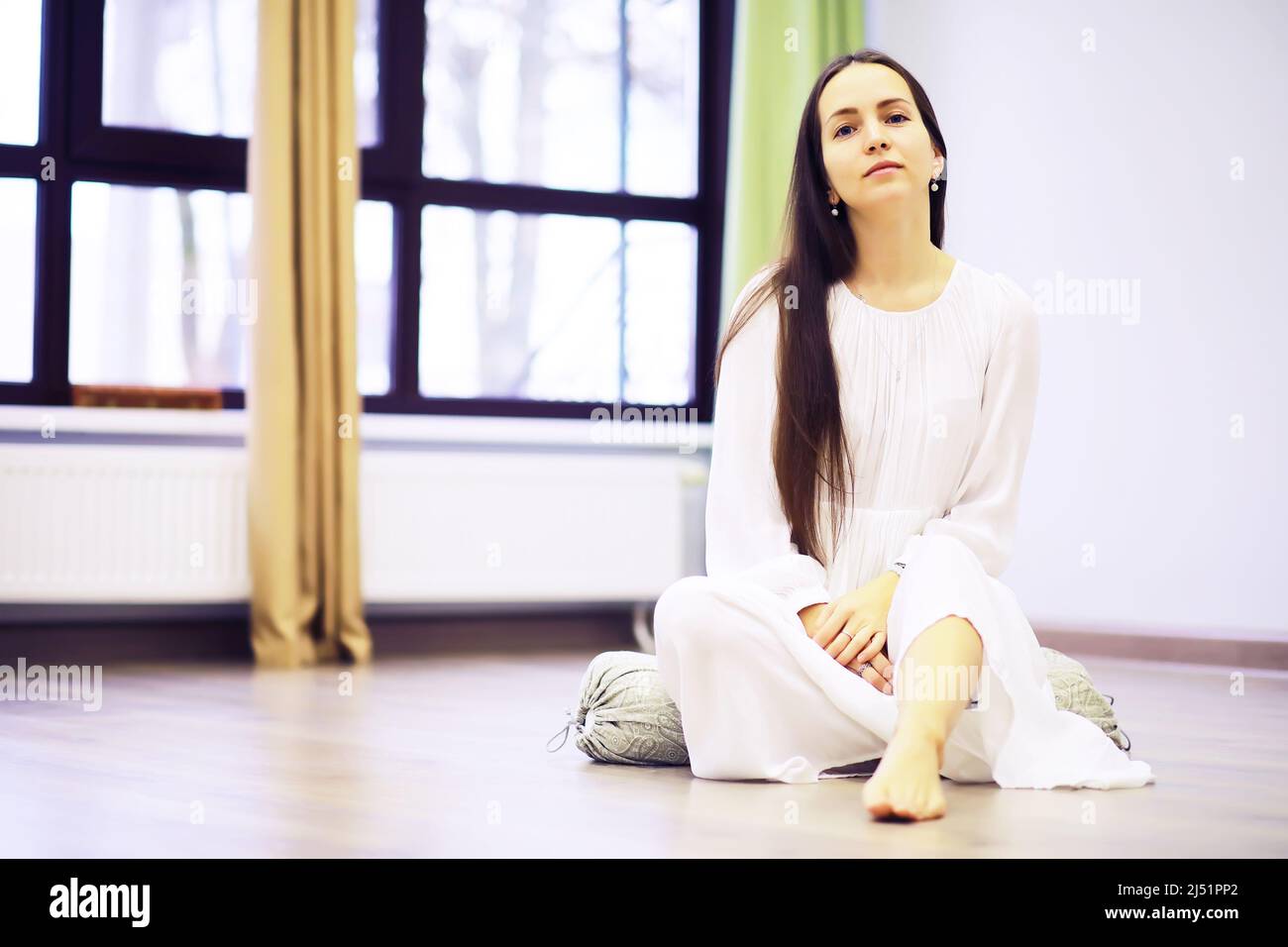 Relaxed serene pretty young woman at home, happy calm lady dream enjoy ...