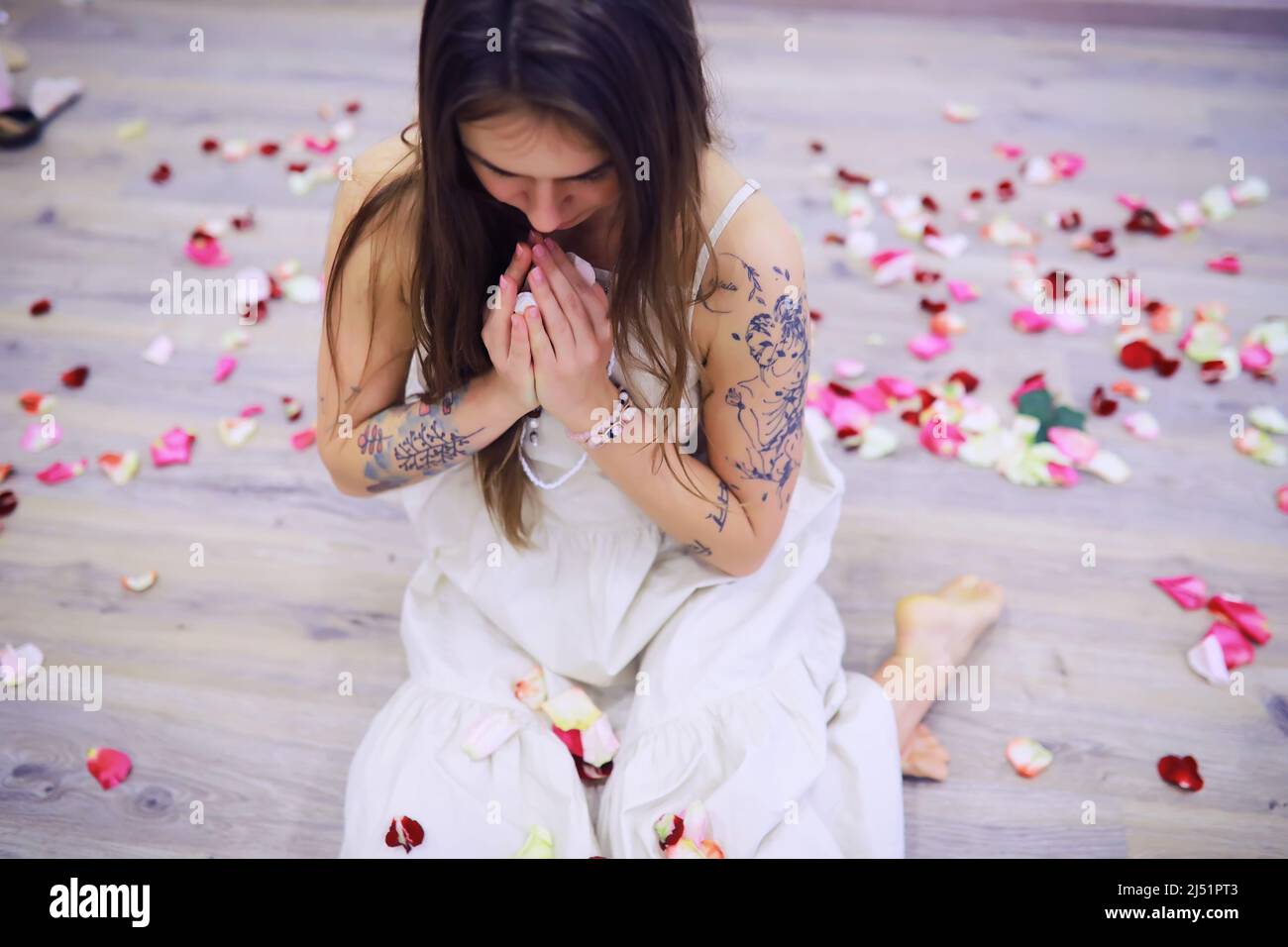 Relaxed serene pretty young woman at home, happy calm lady dream enjoy ...