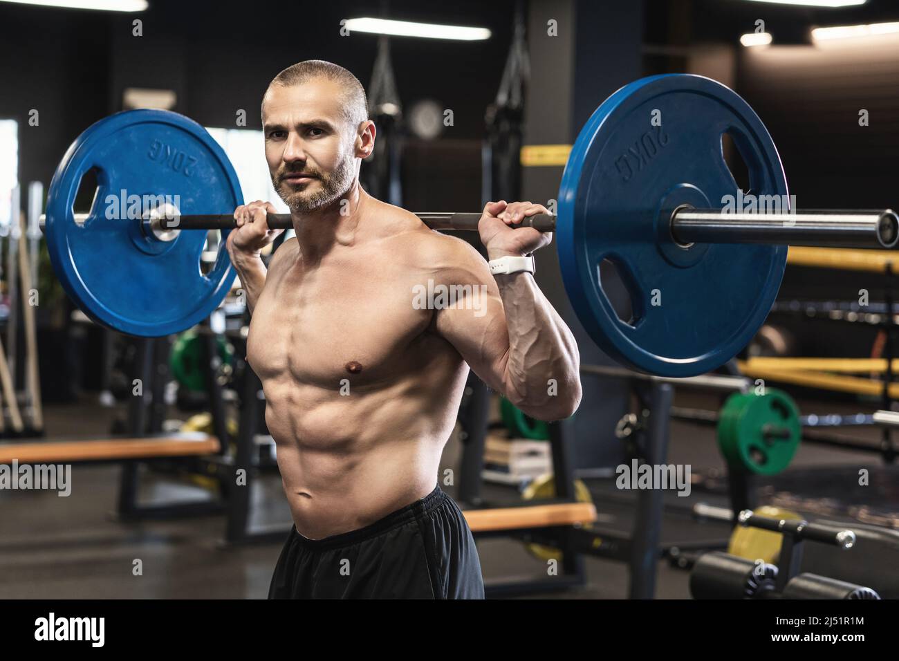 Strong bearded bodybuilder barbell muscular hi-res stock photography ...
