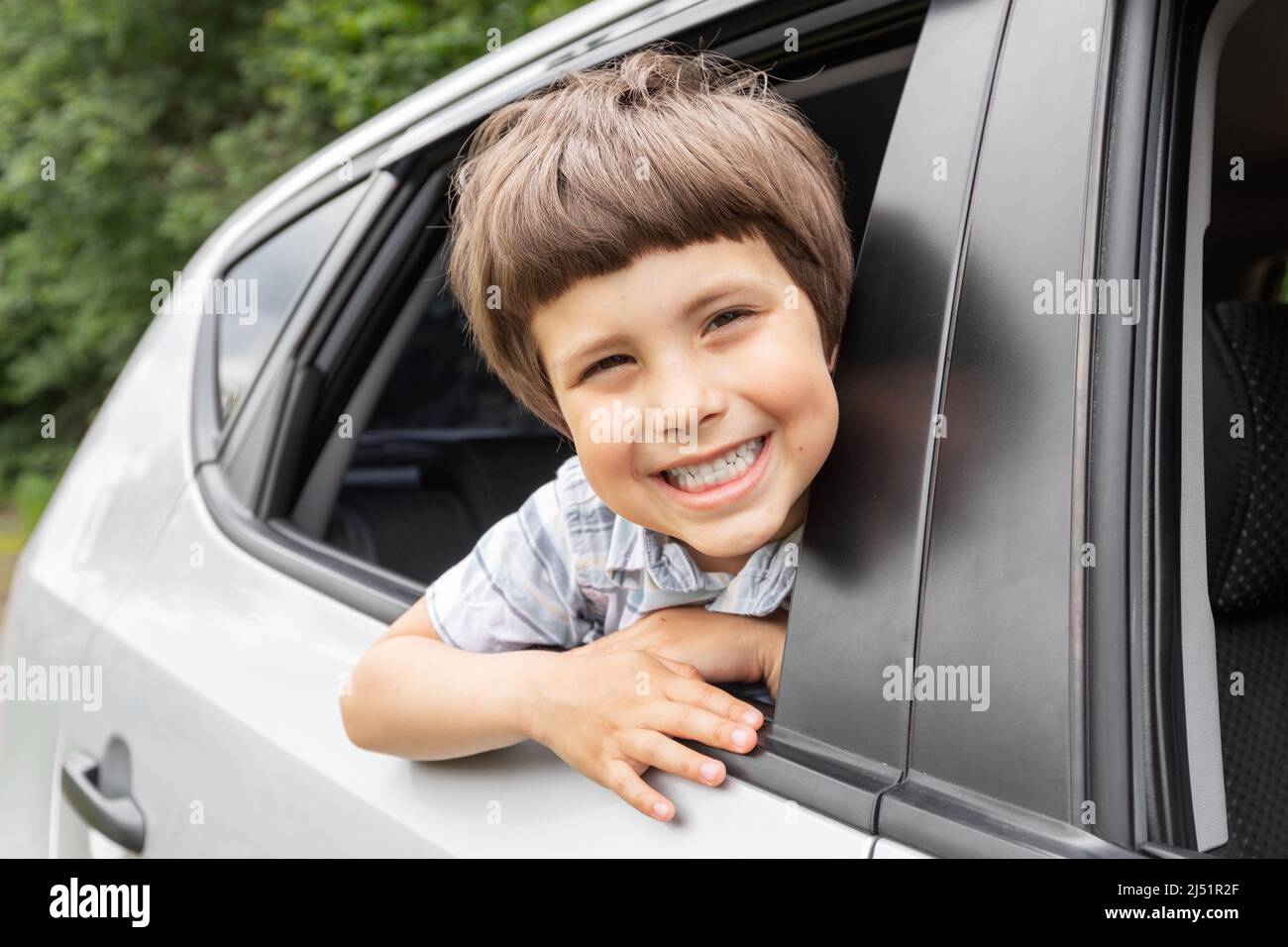 Kid car window hi-res stock photography and images - Alamy