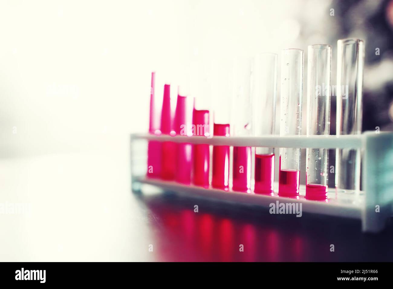 Test tube with blue liquid on laboratory table. Examination of liquid ...