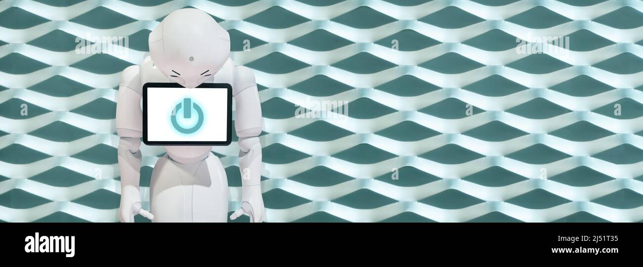 Cute robot looking at its display with power on off button in front of ...