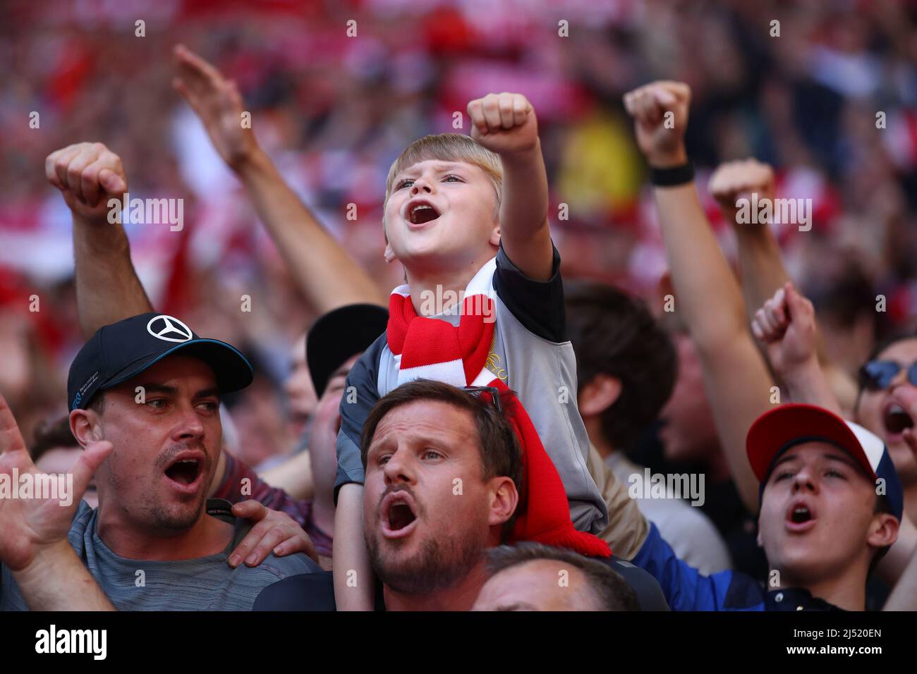 A young Liverpool fan cheers on his side - Manchester City v Liverpool ...