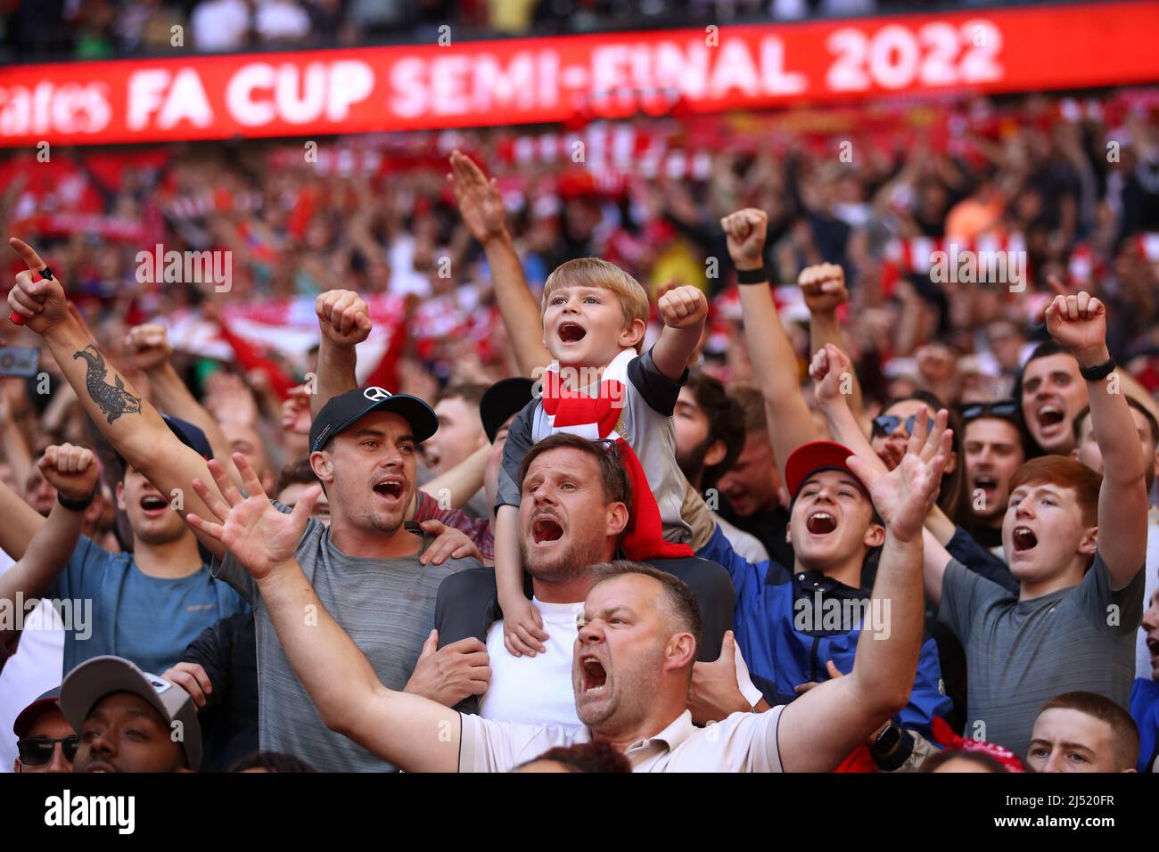 A young Liverpool fan cheers on his side - Manchester City v Liverpool ...