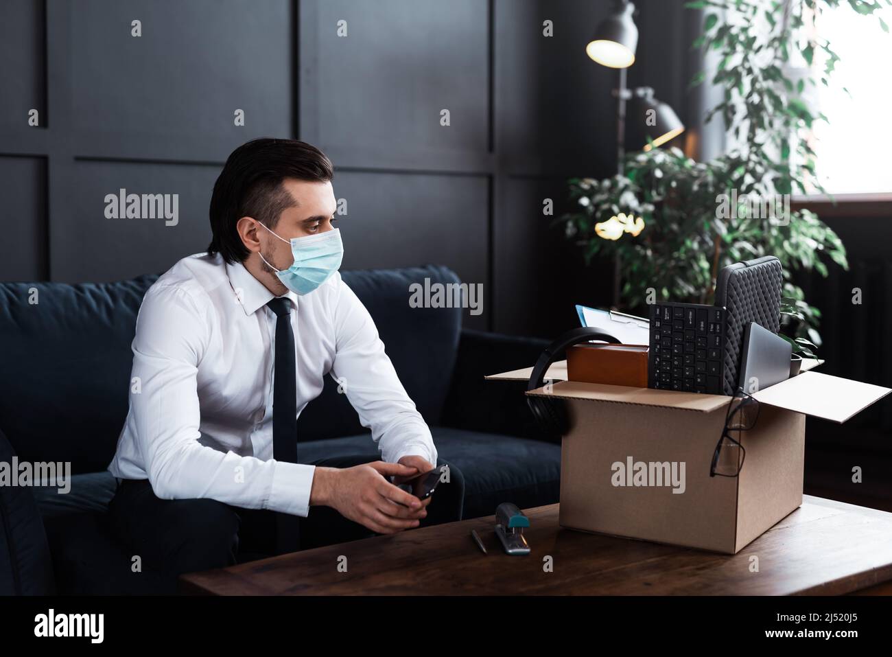 Young man getting fired from his job because of virus pandemic Stock ...