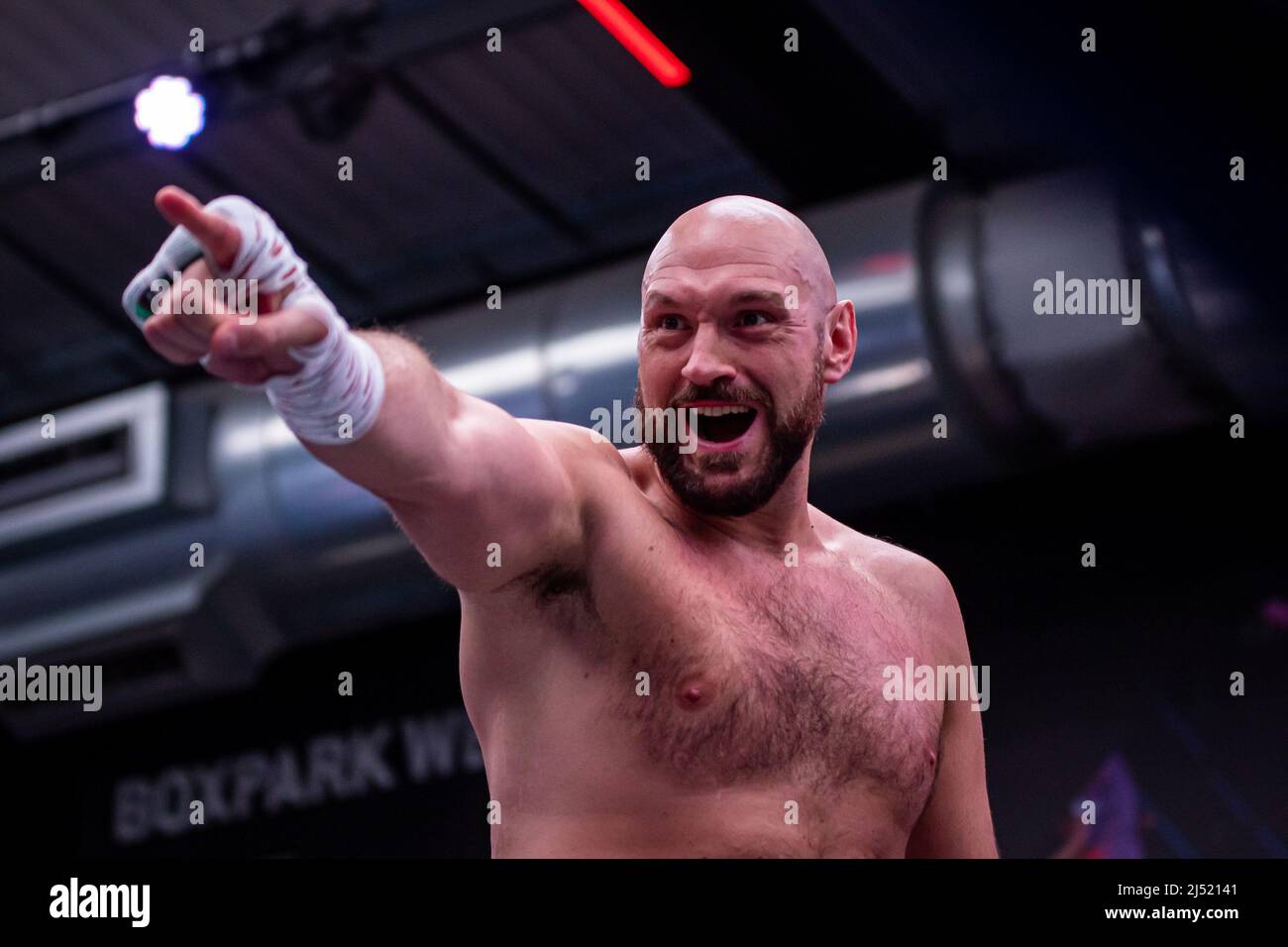 LONDON, ENGLAND - APRIL 19: Tyson Fury hits pads and entertains the ...