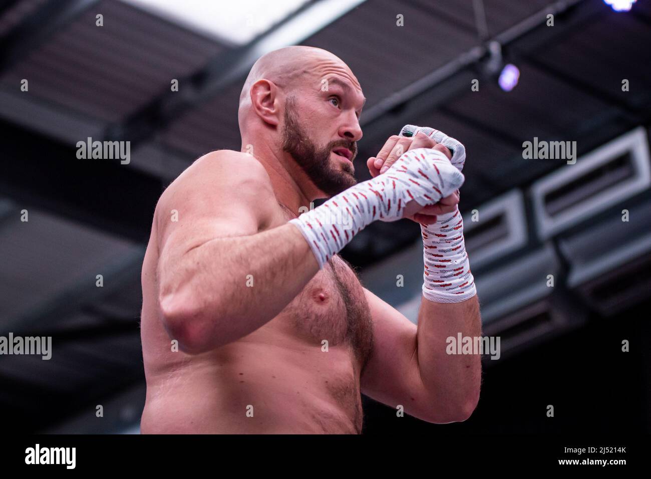 LONDON, ENGLAND - APRIL 19: Tyson Fury hits pads and entertains the ...