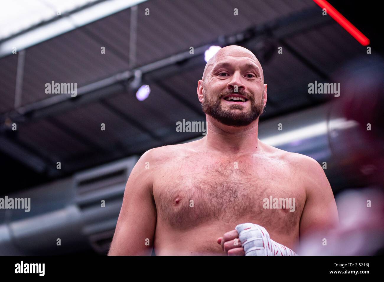 LONDON, ENGLAND - APRIL 19: Tyson Fury hits pads and entertains the ...