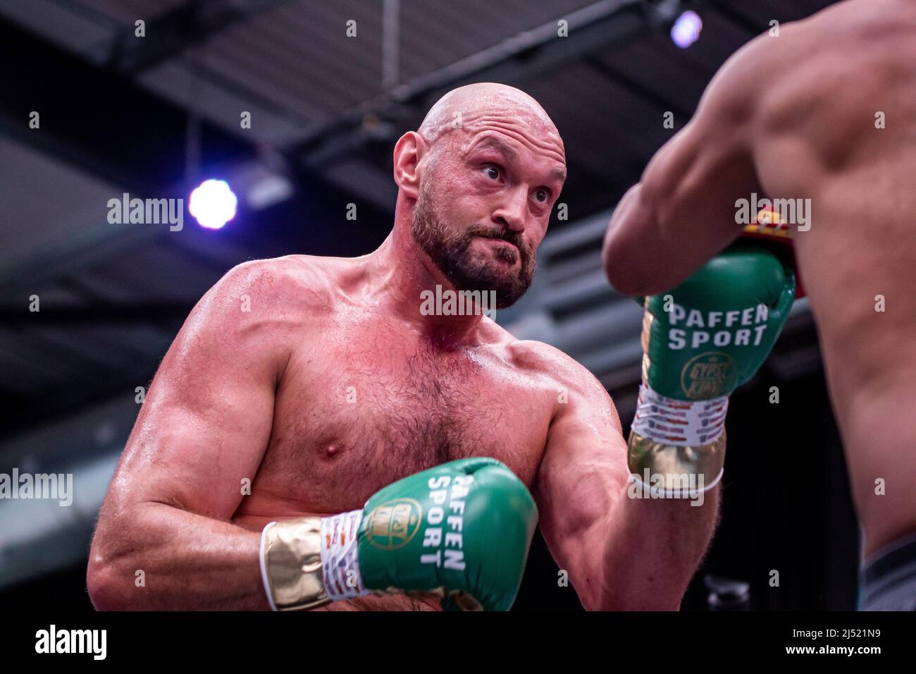 LONDON, ENGLAND - APRIL 19: Tyson Fury hits pads and entertains the ...