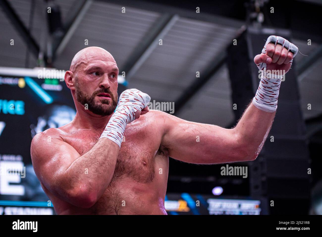 LONDON, ENGLAND - APRIL 19: Tyson Fury hits pads and entertains the ...
