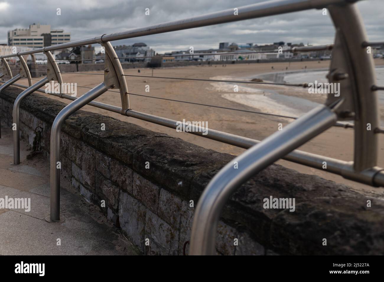 railings along side beach wall at Western super mare Stock Photo - Alamy