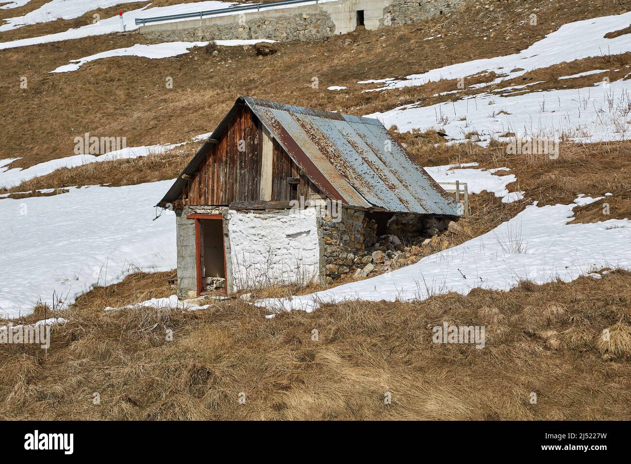 Hut on an Alpine slope Stock Photo - Alamy