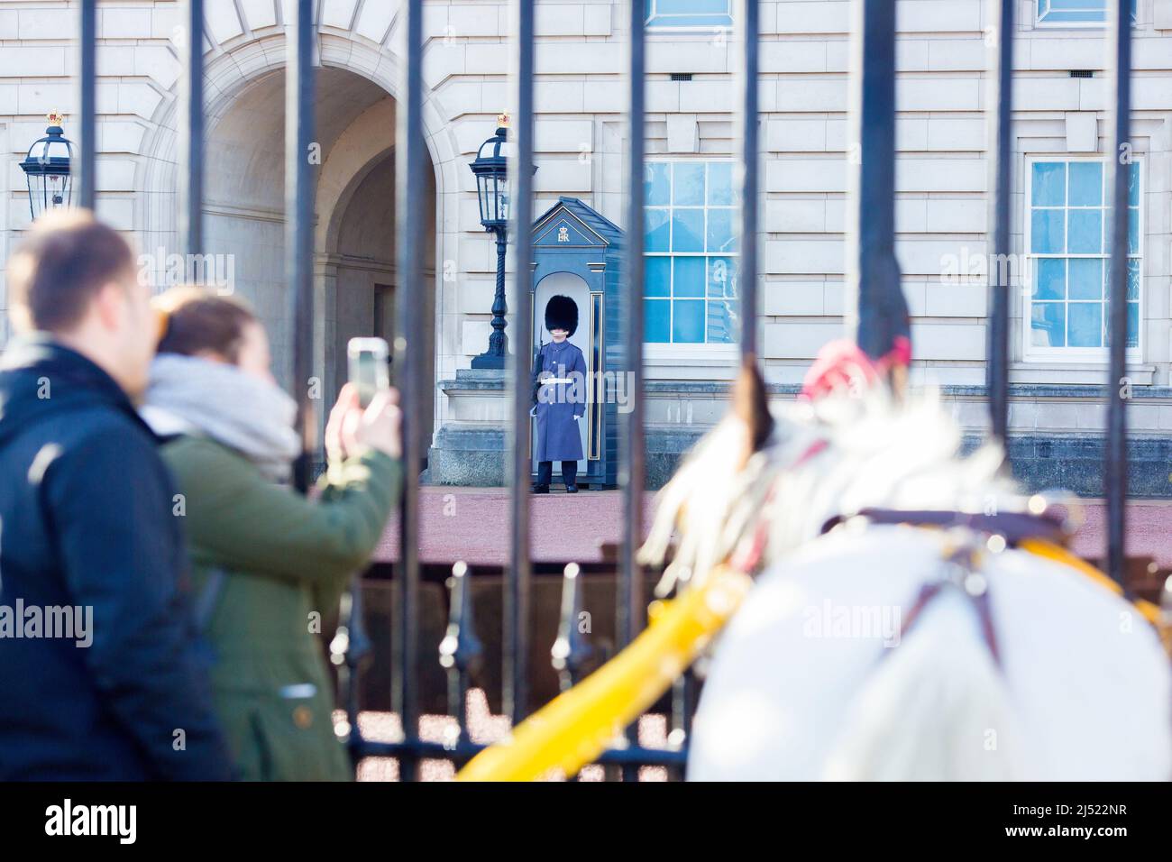 People gather outside Buckingham Palace in central London ahead of ...