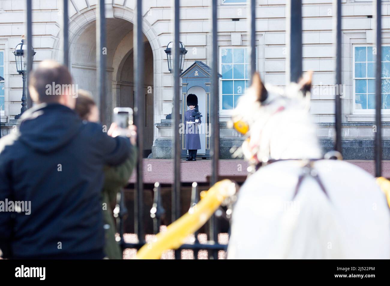 People gather outside Buckingham Palace in central London ahead of ...