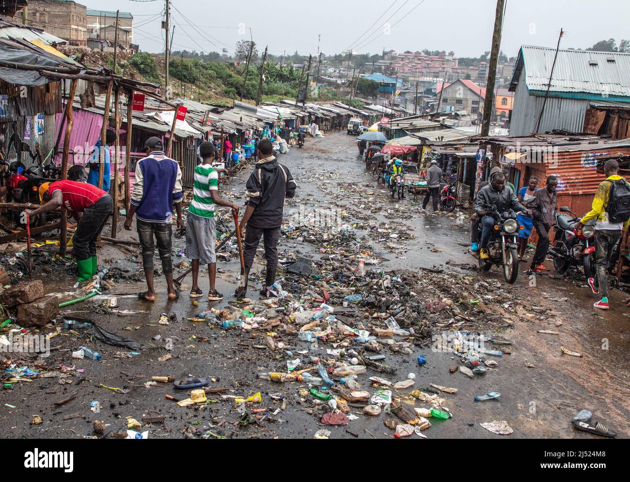 Rubbish spread along a street road in Kibera by a heavy rain on April ...