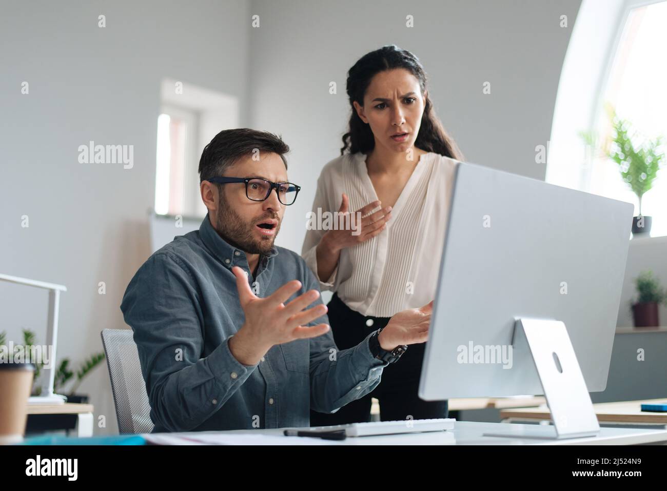 Workplace stress. Angry female boss scolding stressed male employee for ...