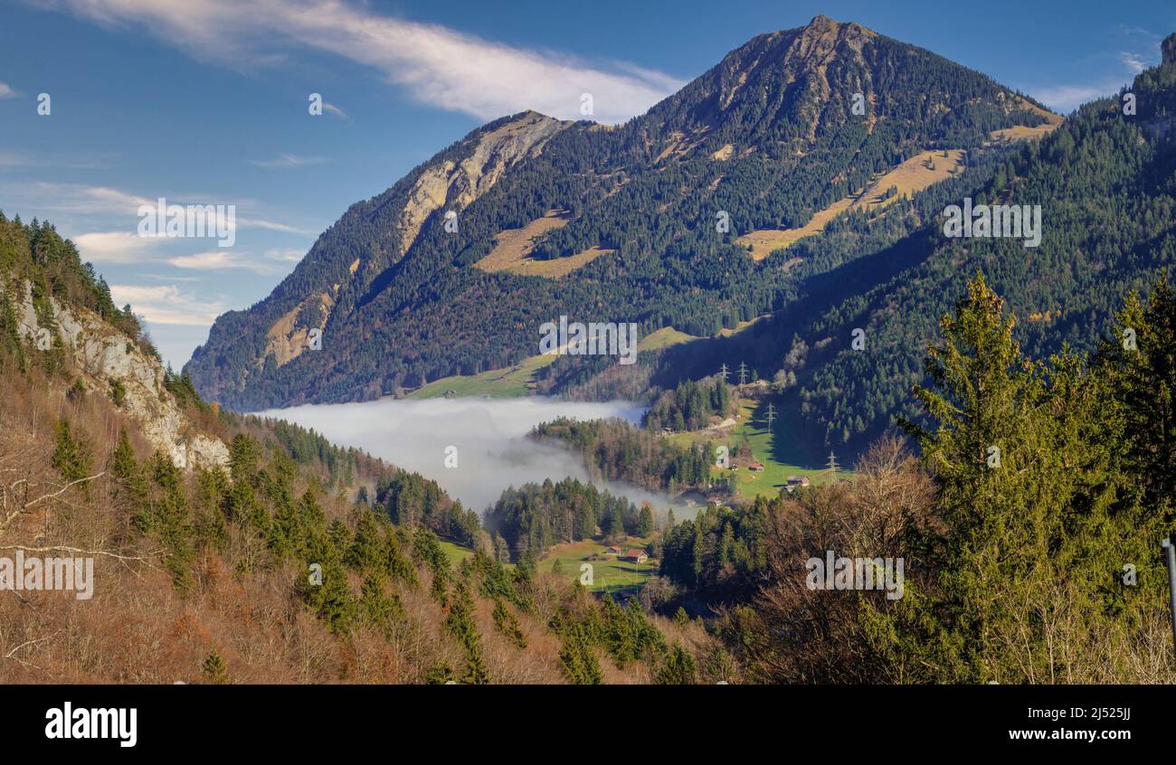 Swiss alps with the blanket of clouds in the valey Stock Photo - Alamy