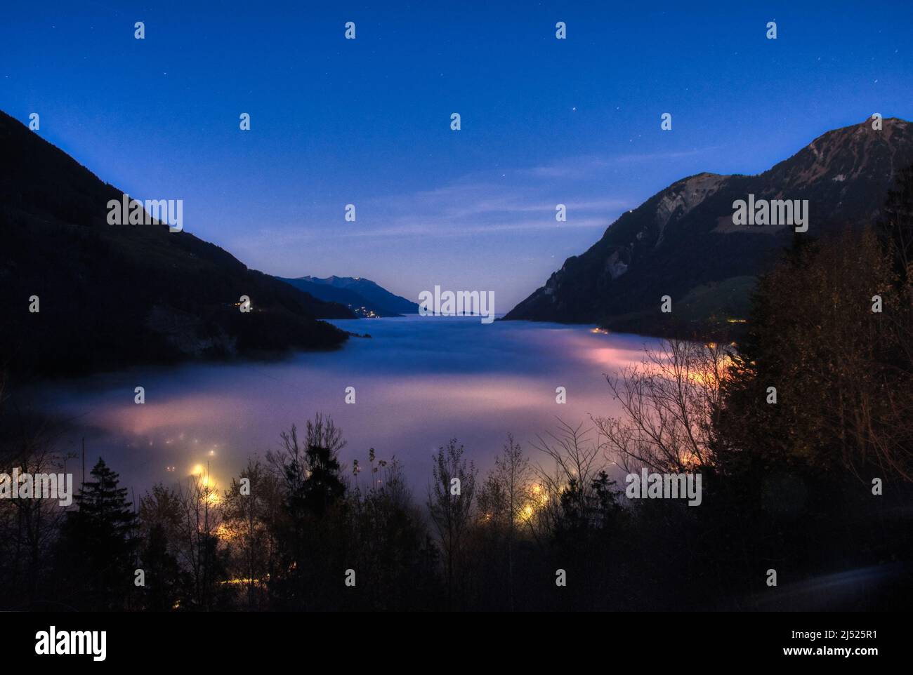 Swiss alps with the blanket of clouds in the valey Stock Photo - Alamy