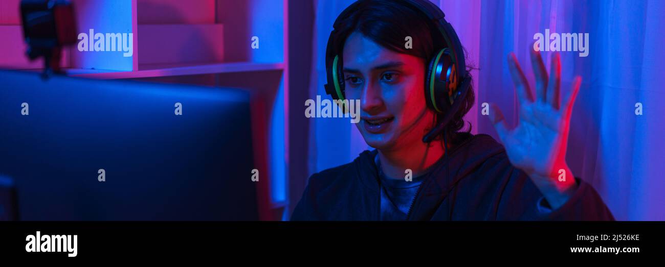 Game stream concept, Male streamer play game online and greeting with ...