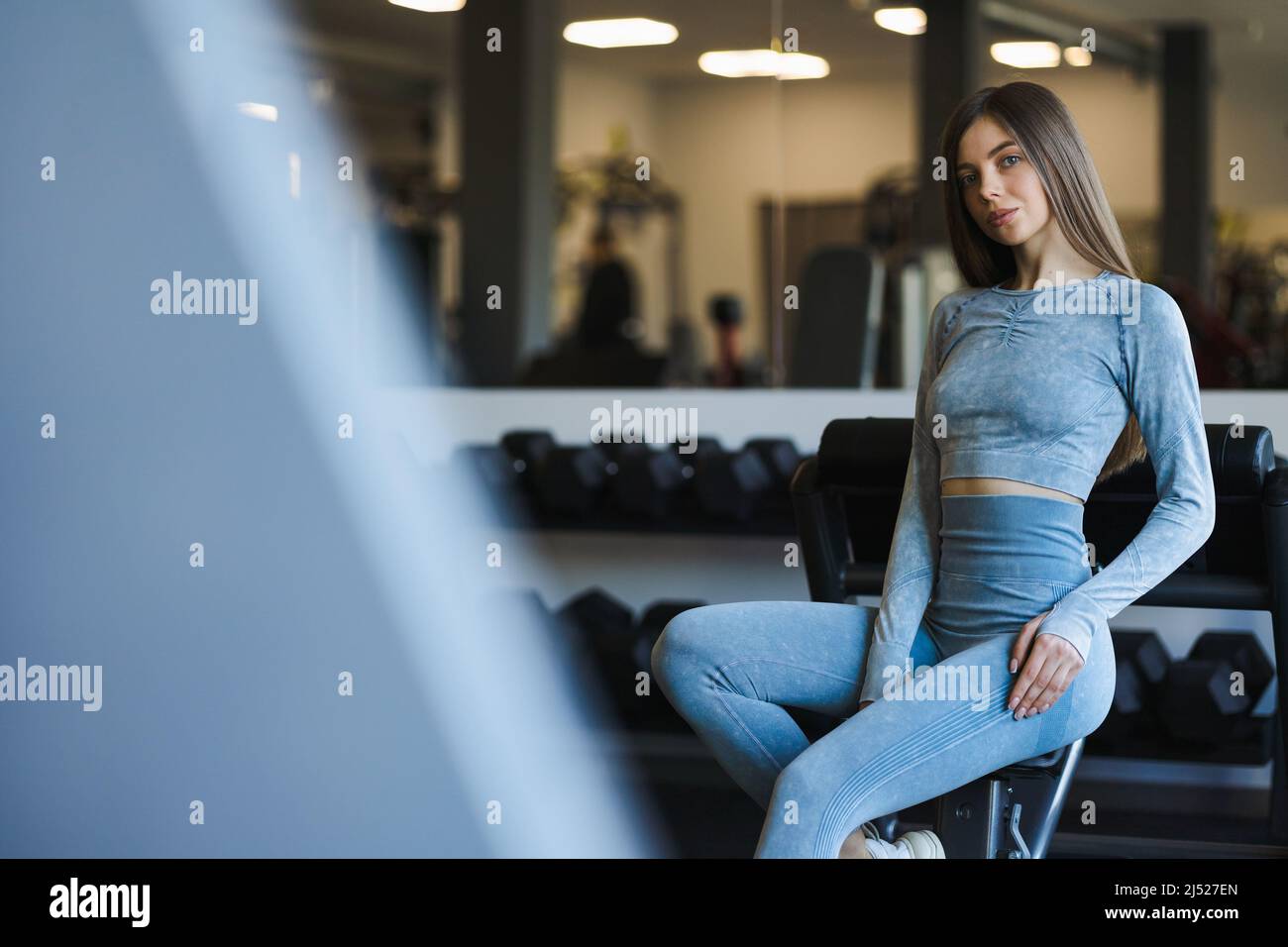 Portrait of a beautiful fitness model in the gym Stock Photo - Alamy