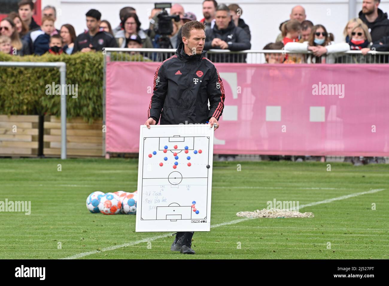 coach Julian NAGELSMANN (FC Bayern Munich) holds a tactics board ...