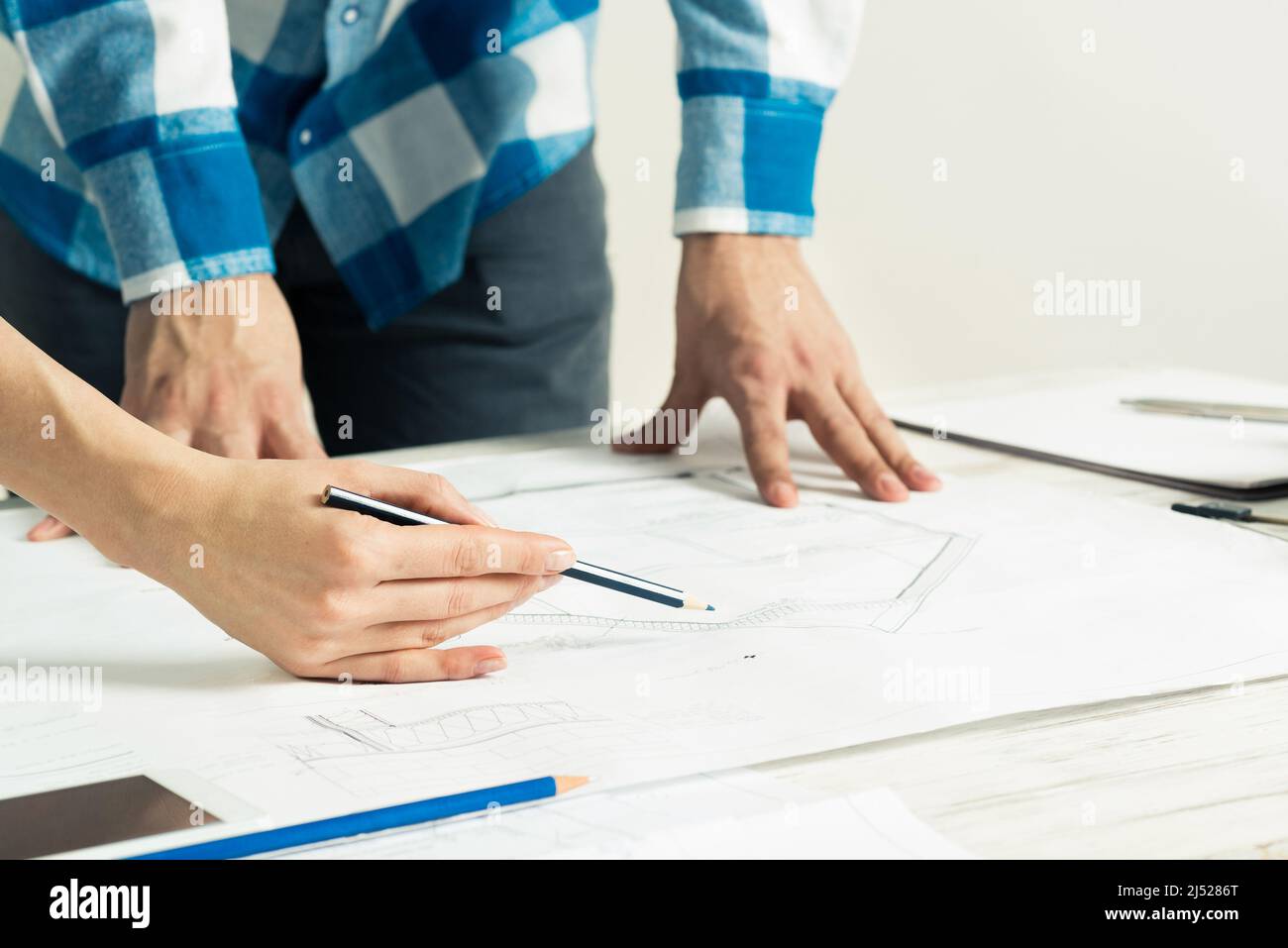 Design project discussing in architecture studio Stock Photo - Alamy