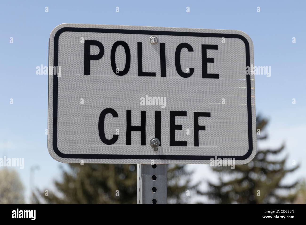 Police Chief sign in a parking lot. The police chief needs a parking ...
