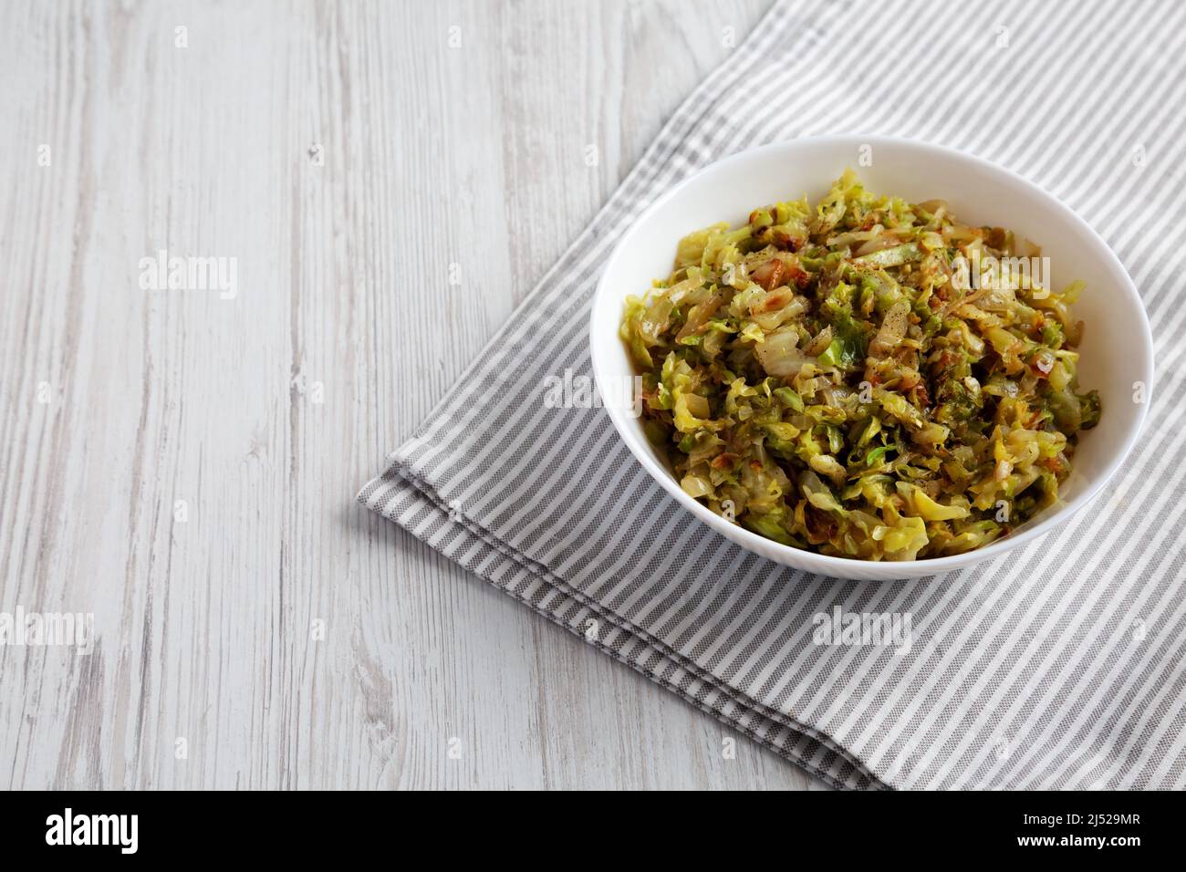 Homemade Irish Sauteed Cabbage in a Bowl, side view. Copy space Stock ...