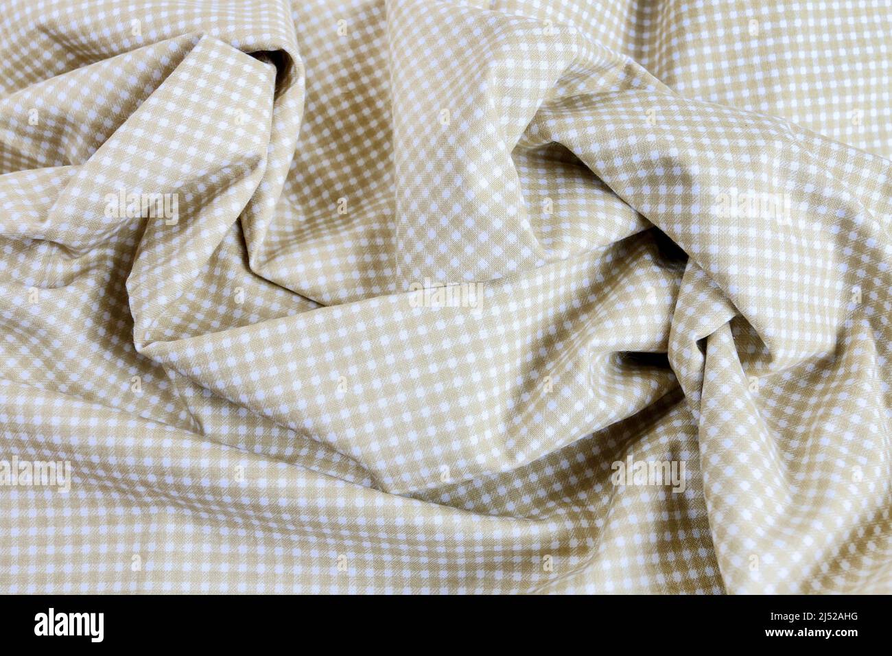 A beige and white, checkered sheet, wavy background. Graphic resources ...