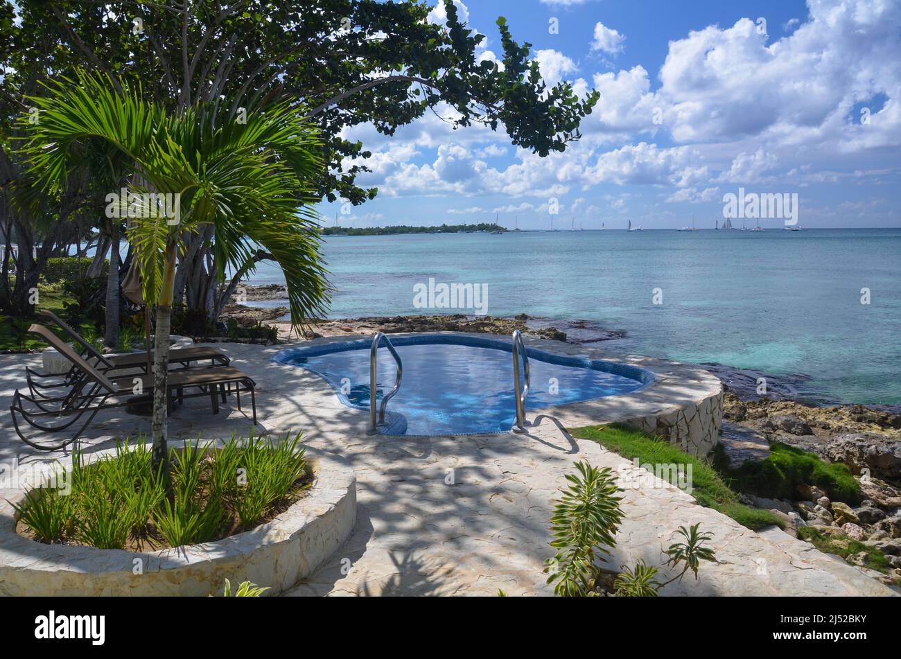 Small swimming pool by the shore in Caribbean Stock Photo - Alamy