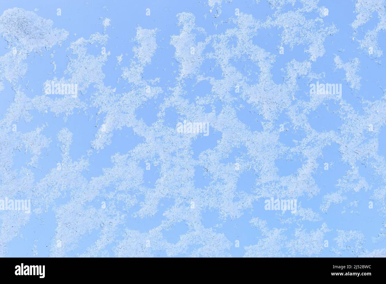 Melting snow on the glass - abstract winter background. Graphic ...