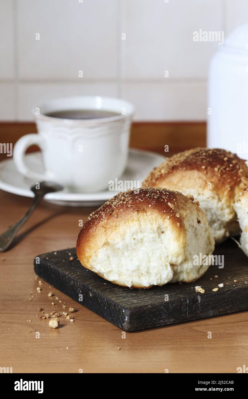 Homemade sweet buns on the table. Breakfast time Stock Photo - Alamy