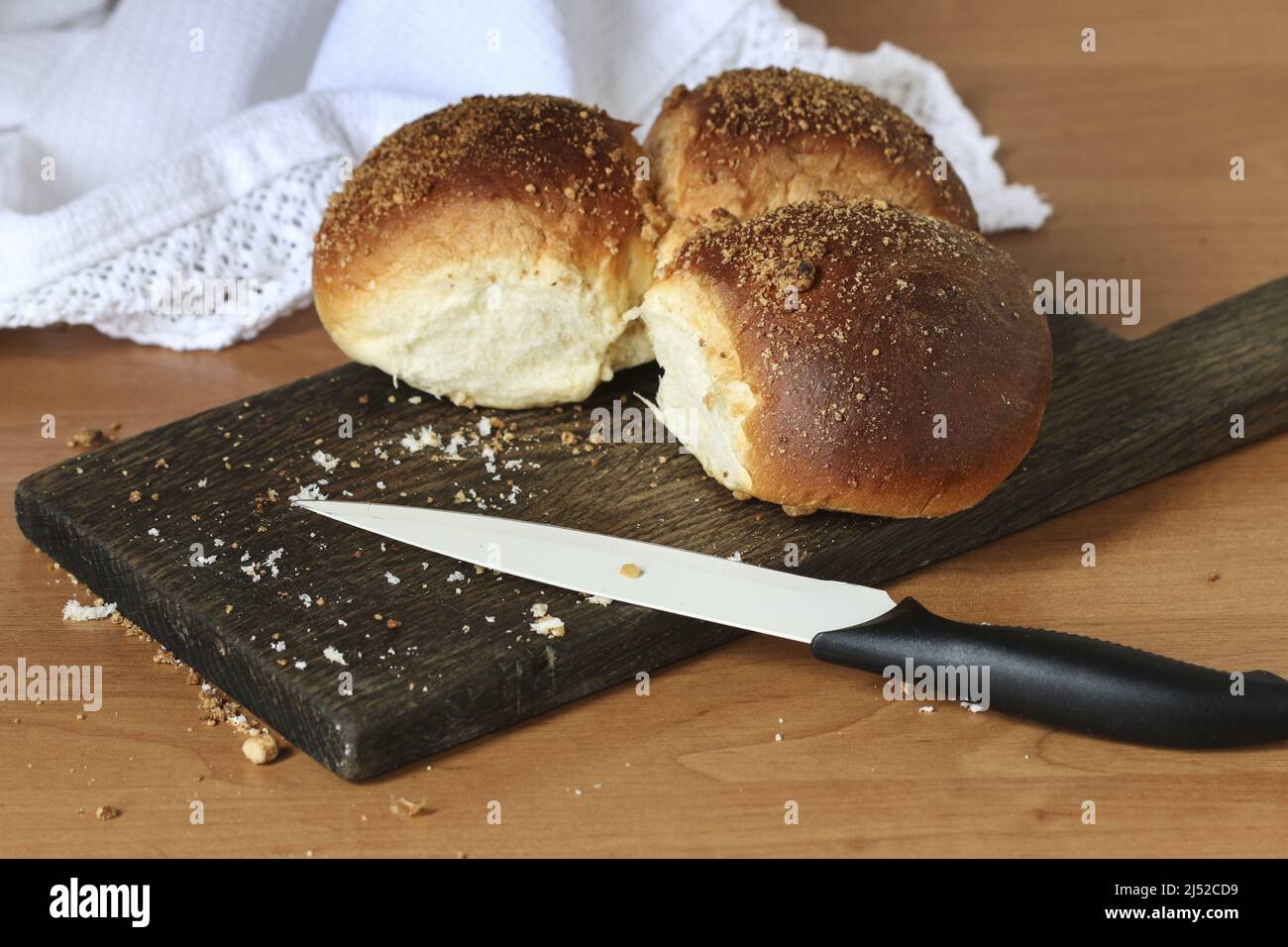 Homemade sweet buns on the table. Breakfast time Stock Photo - Alamy