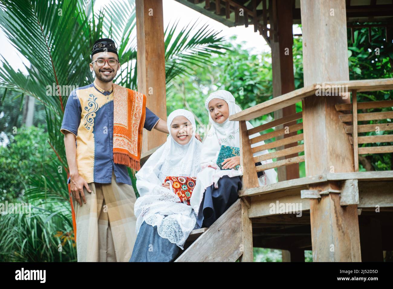family muslim sitting in the garden and having a conversation Stock ...