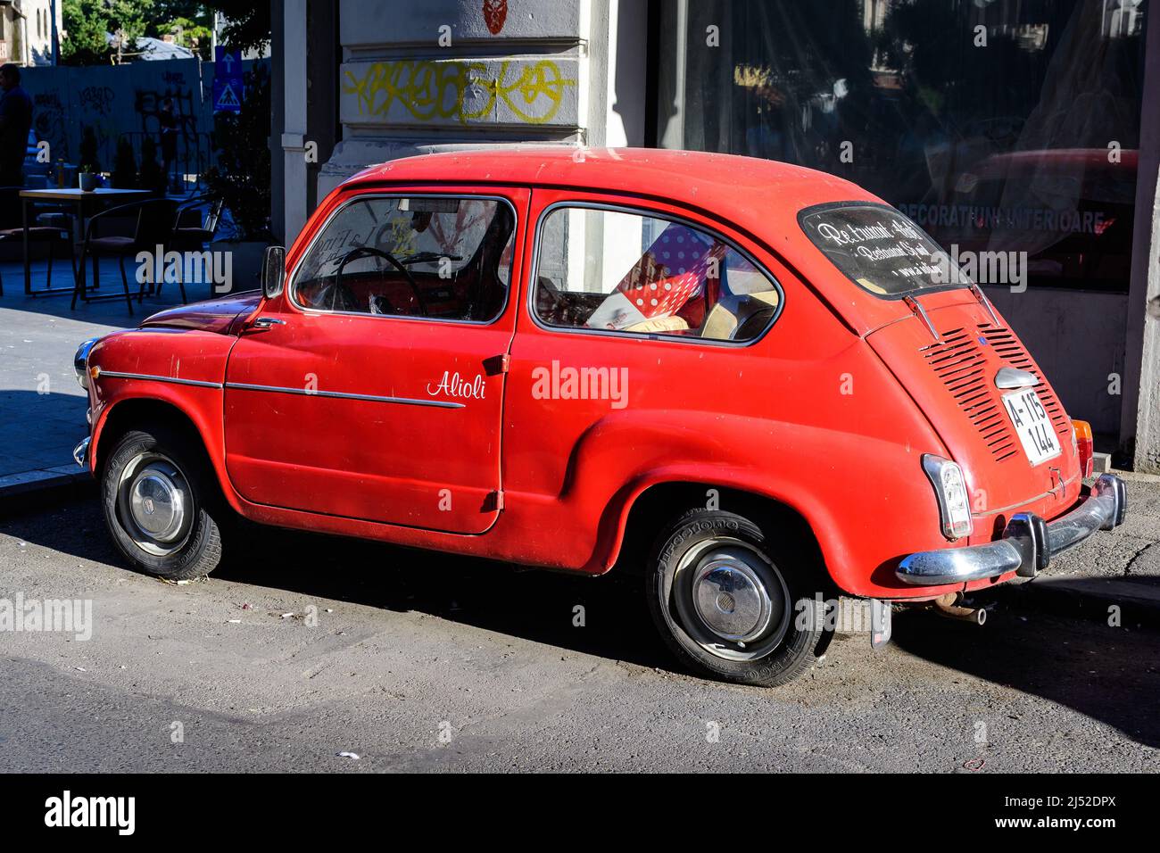 Bucharest, Romania, 25 September 2021: One vivid red small Fiat vintage ...