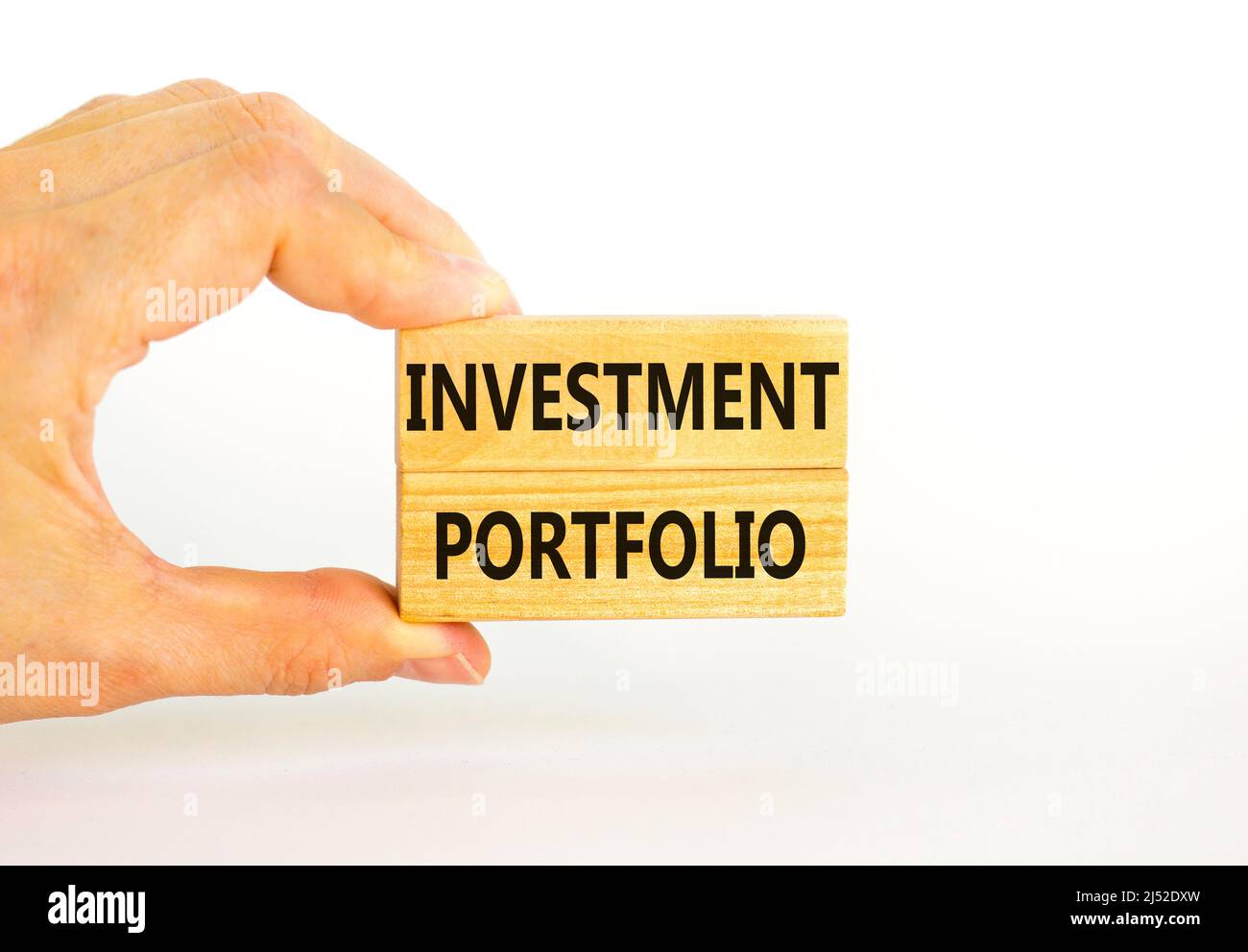Investment portfolio symbol. Wooden blocks with concept words ...
