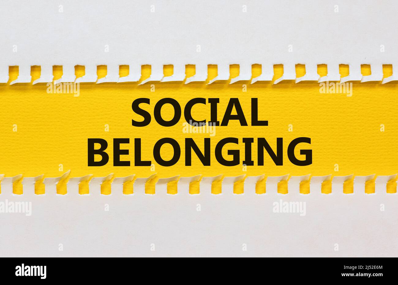 Social belonging symbol. Yellow and white paper with concept words ...
