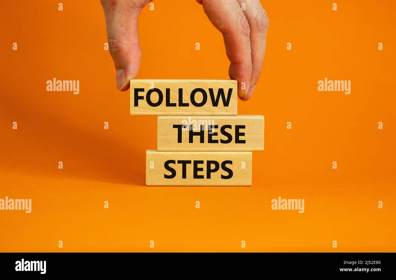 Follow these steps symbol. Concept words Follow these steps on wooden ...
