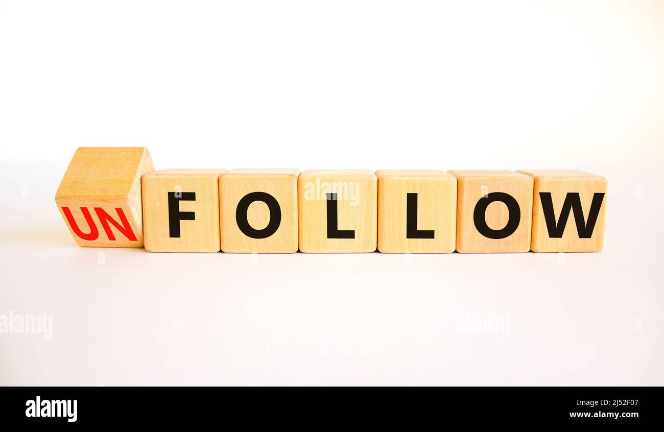 Follow or unfollow symbol. Turned wooden cubes and changed concept ...
