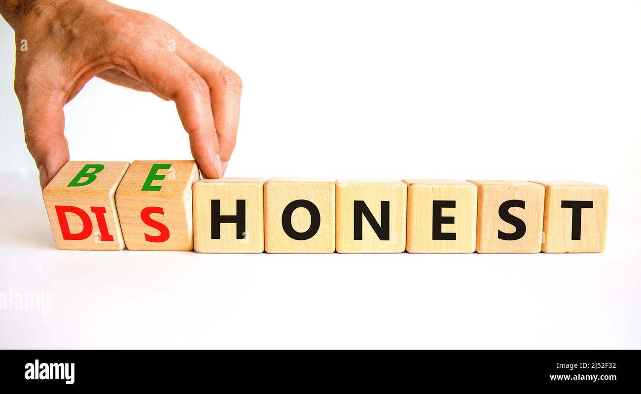 Be honest or dishonest symbol. Businessman turns cubes and changes ...
