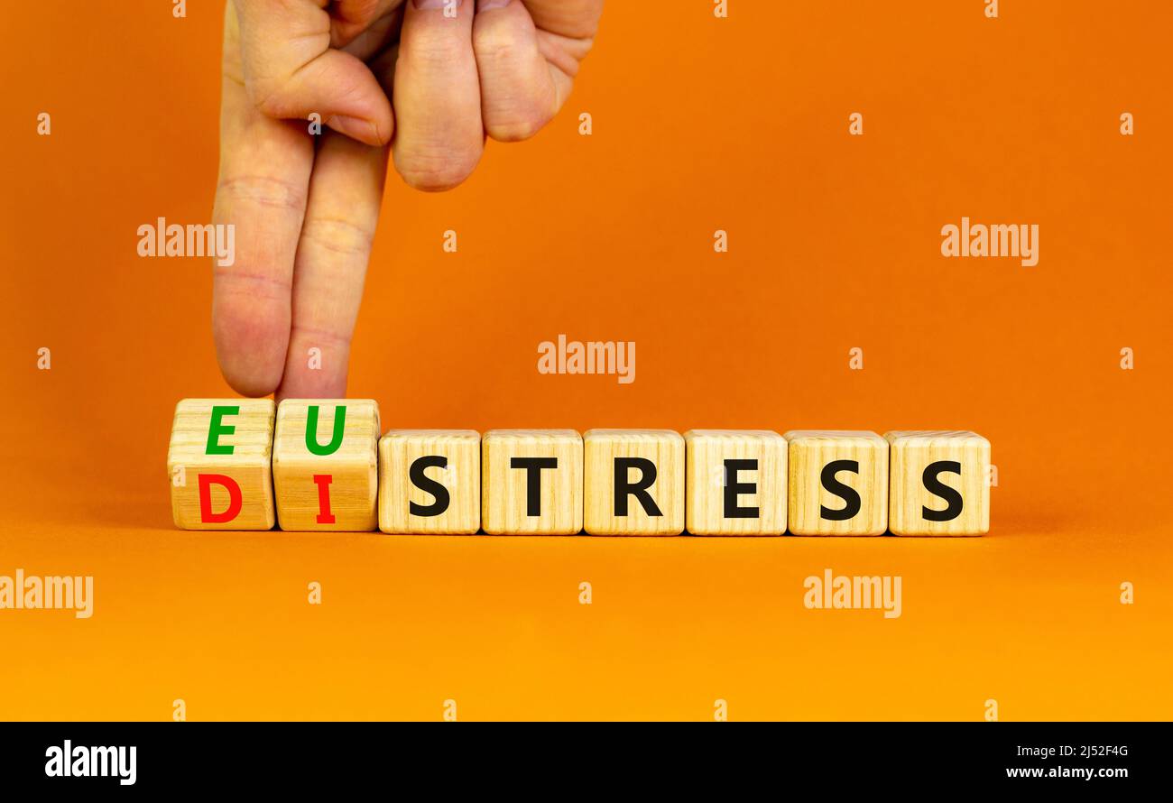 Eustress or distress symbol. Psychologist turns cubes and changes the ...