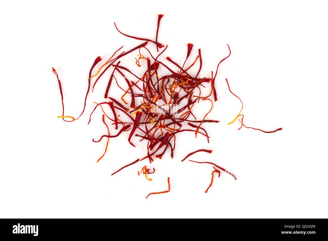 Dried saffron spice pieces isolated on a white background Stock Photo ...