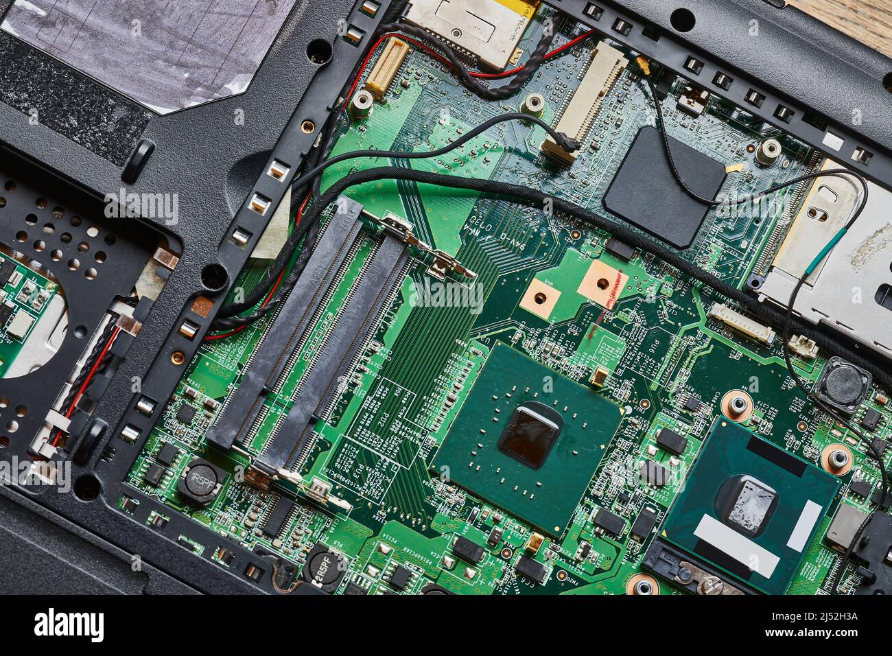 Circuit board closeup, laptop interiors Stock Photo - Alamy