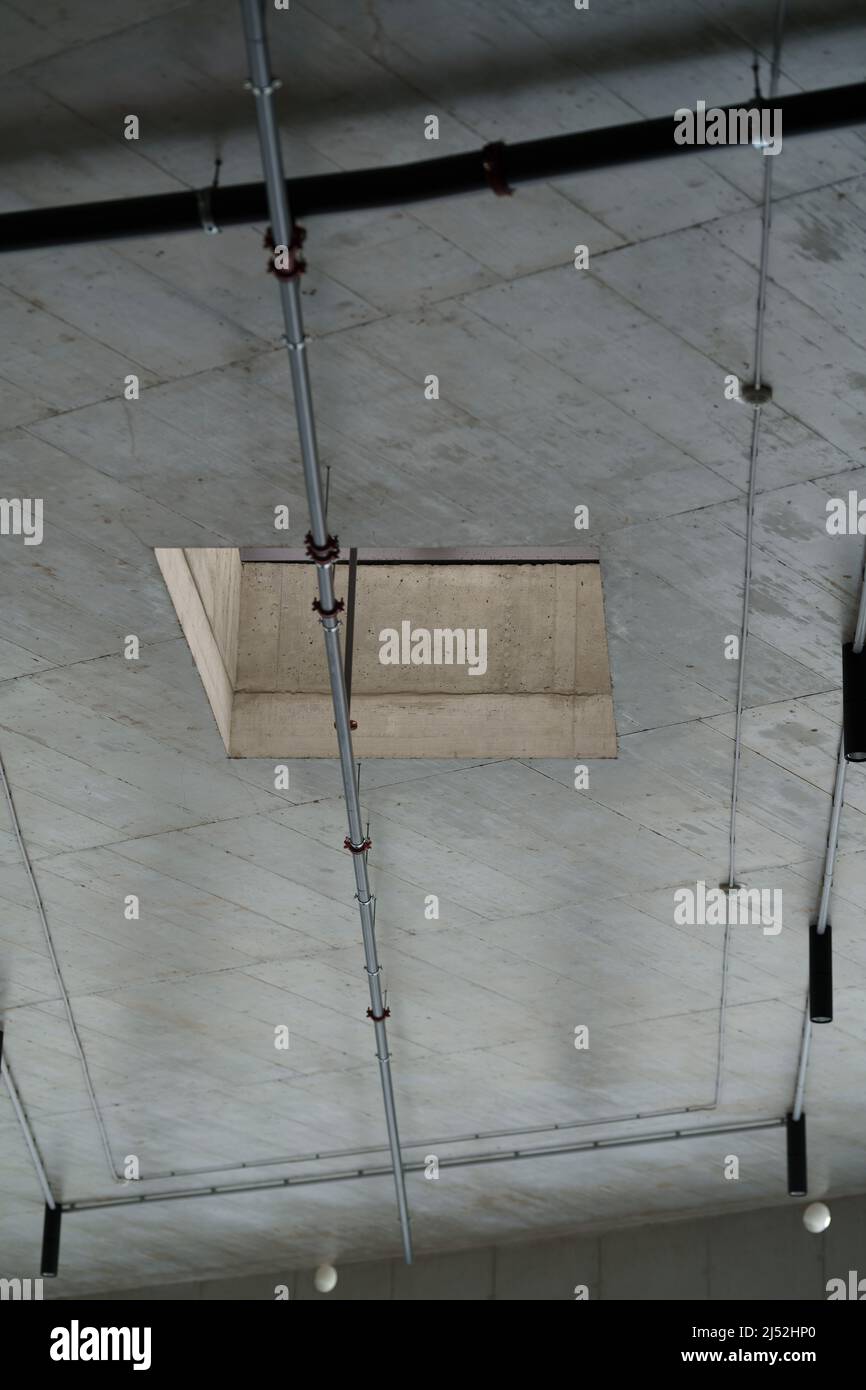 A high industrial, loft room with a ventilation and smoke exhaust flap ...