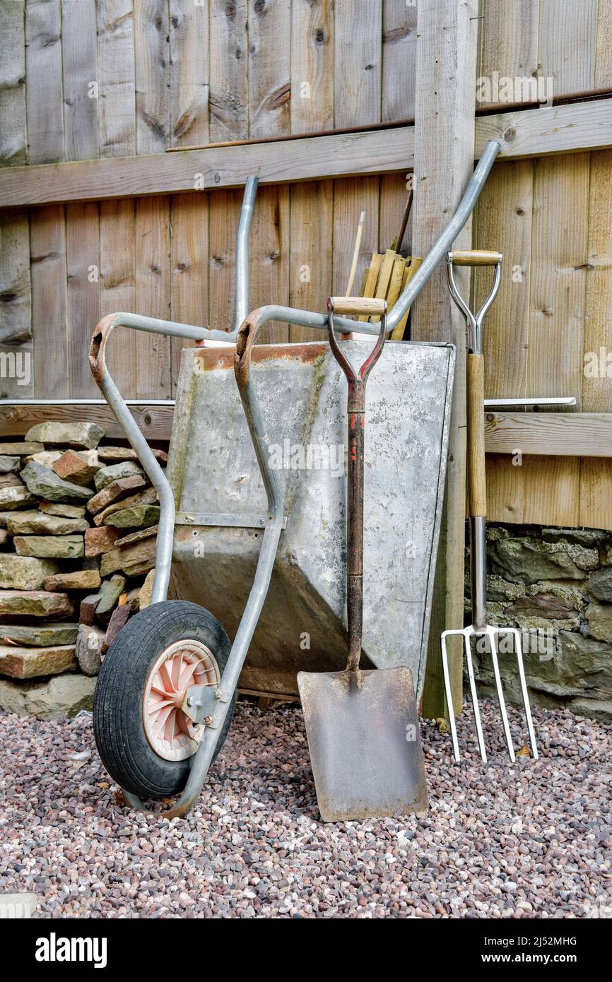 Wooden wheel barrow hi-res stock photography and images - Alamy