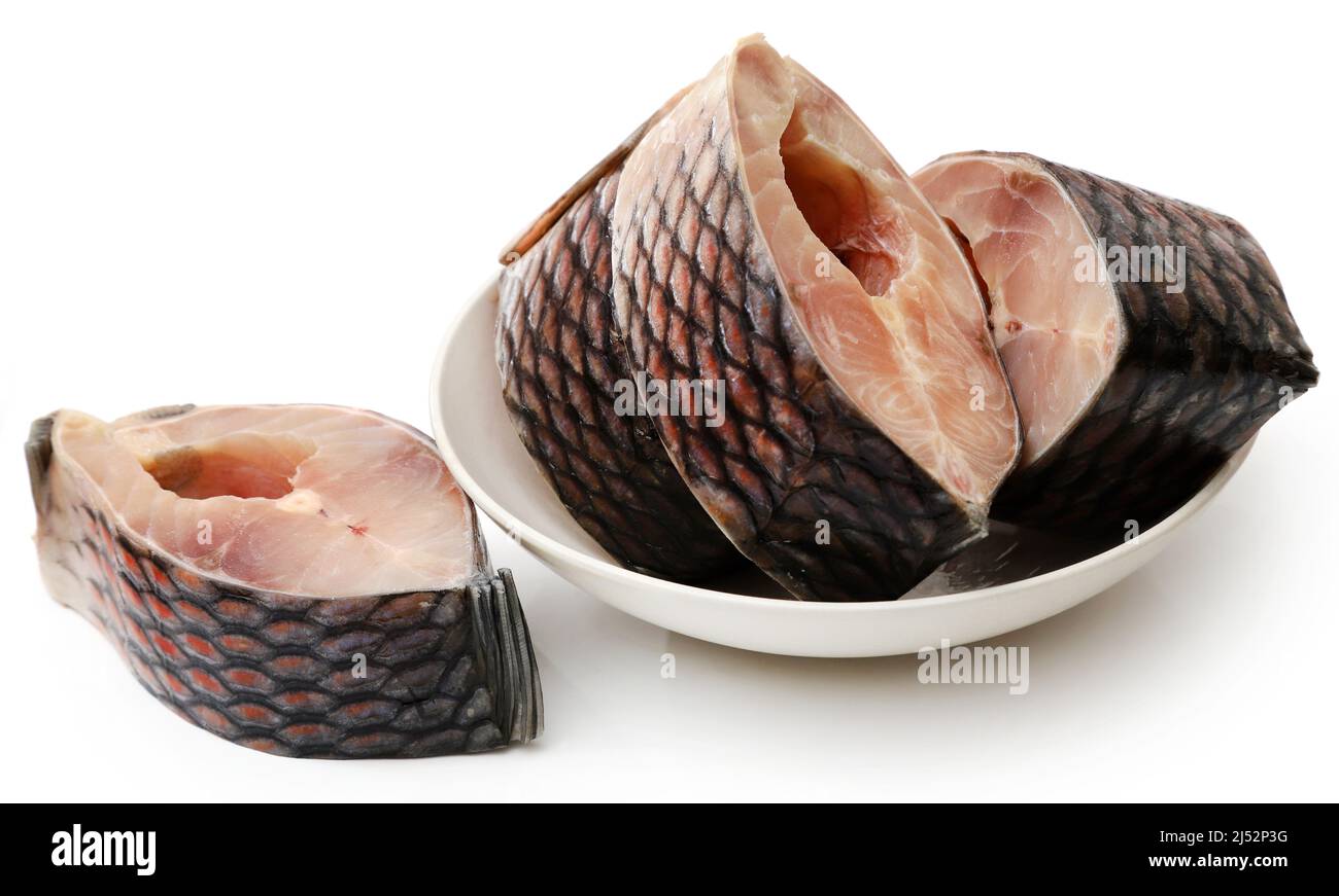 Popular rohu fish sliced over white background Stock Photo - Alamy