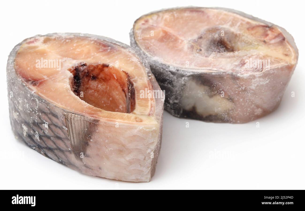 Popular rohu fish sliced and frozen over white background Stock Photo ...