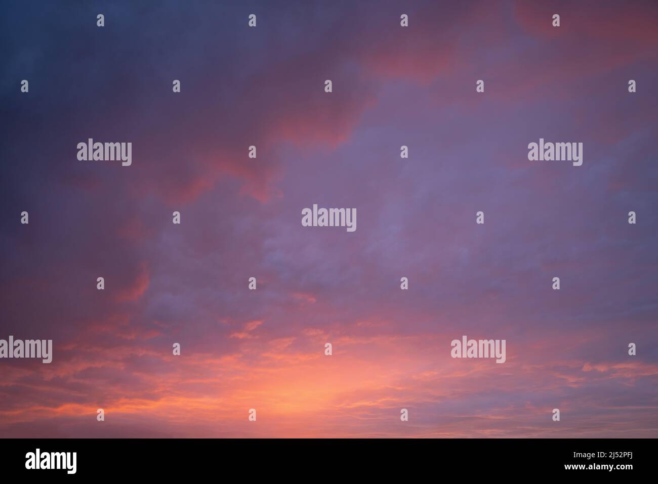 Evening sky with pastel-colored clouds Stock Photo - Alamy