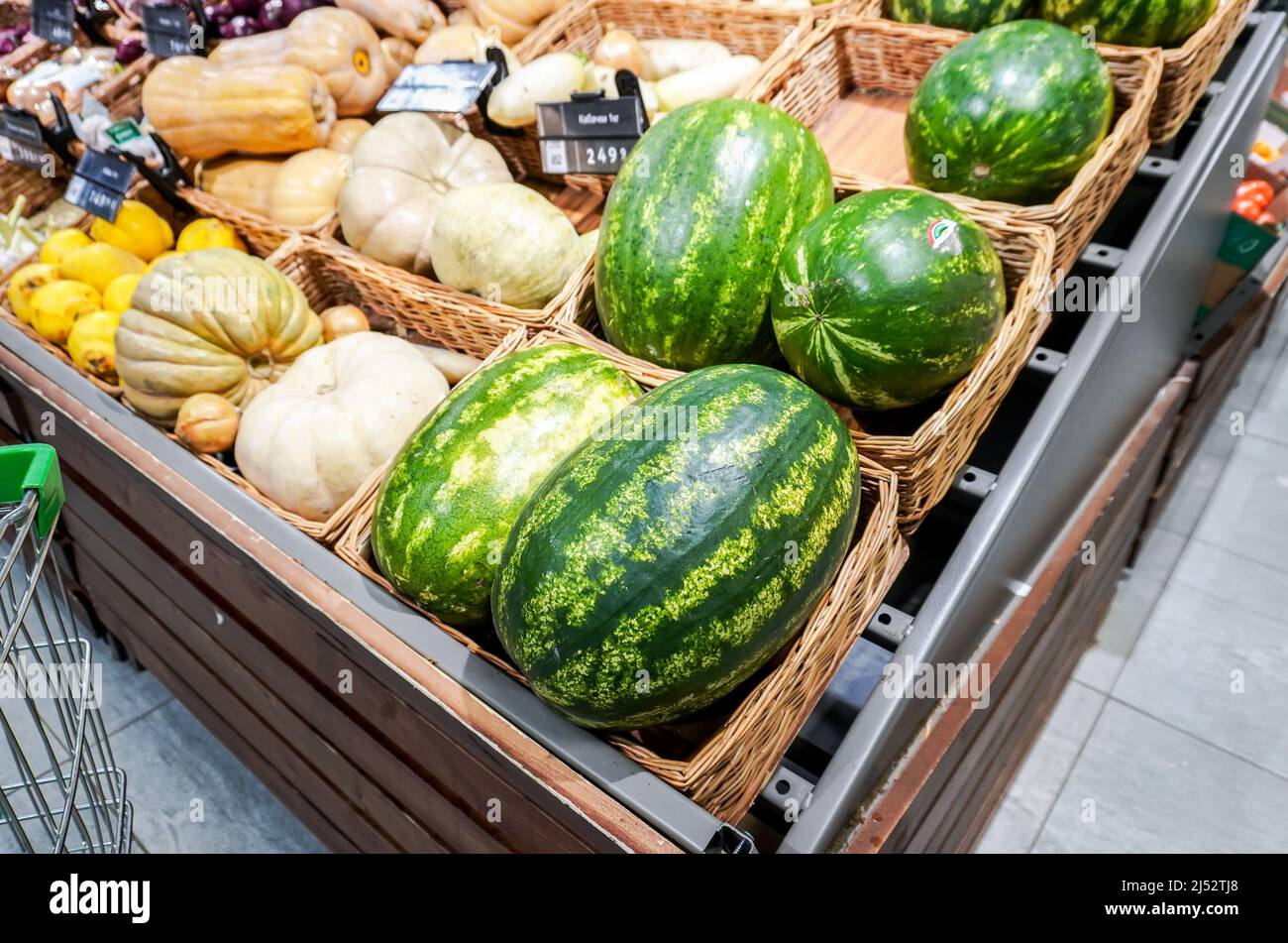 Fresh watermelons and vegetables selling at the grocery store Stock ...